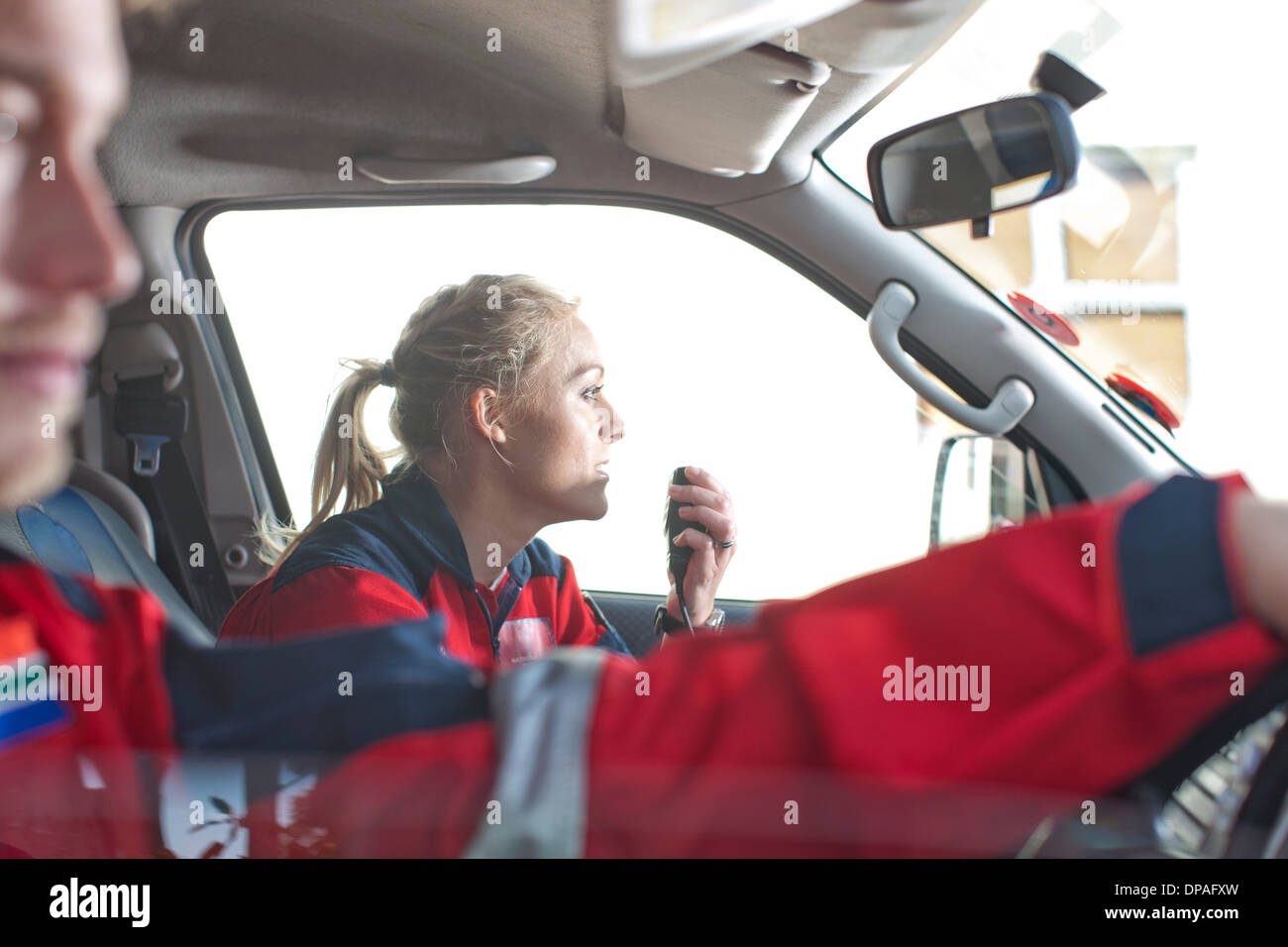 Paramedics driving to emergency in ambulance Stock Photo - Alamy