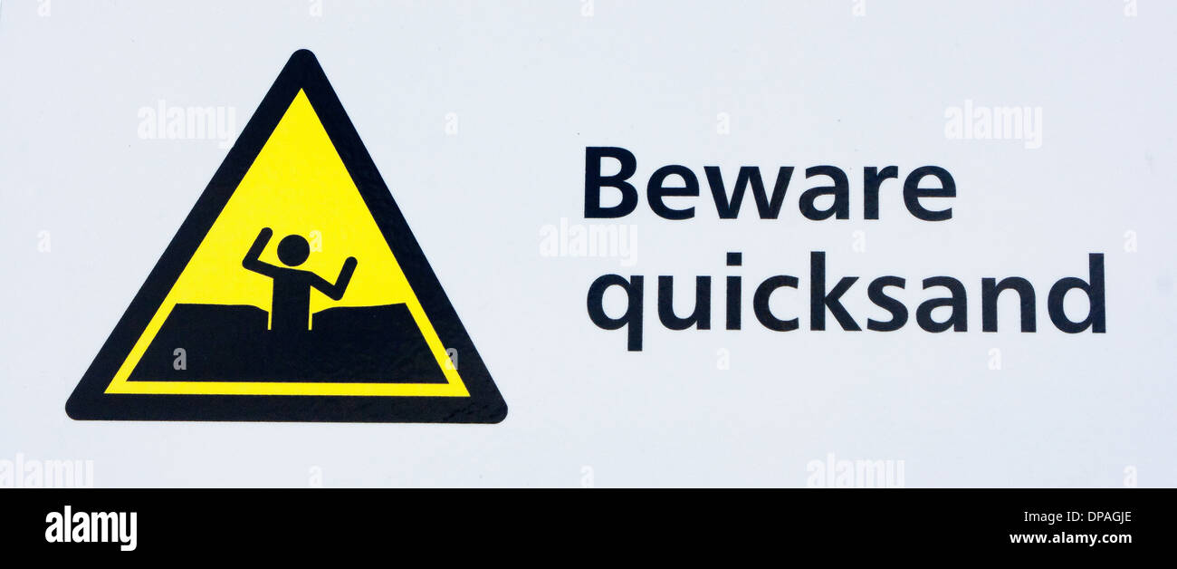 Beware quicksand sign Stock Photo - Alamy