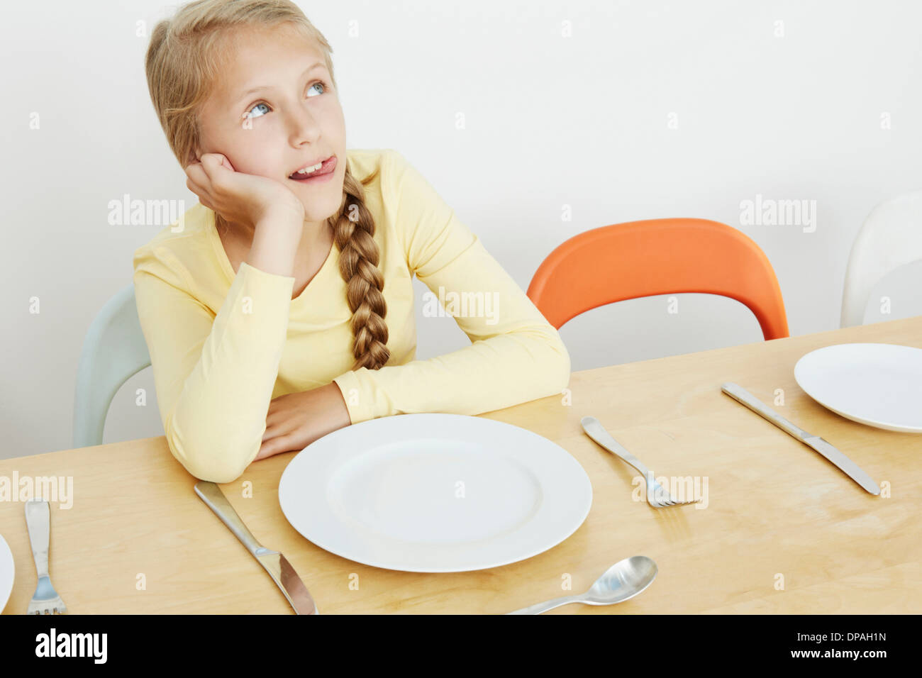 Licking plate hi-res stock photography and images - Alamy