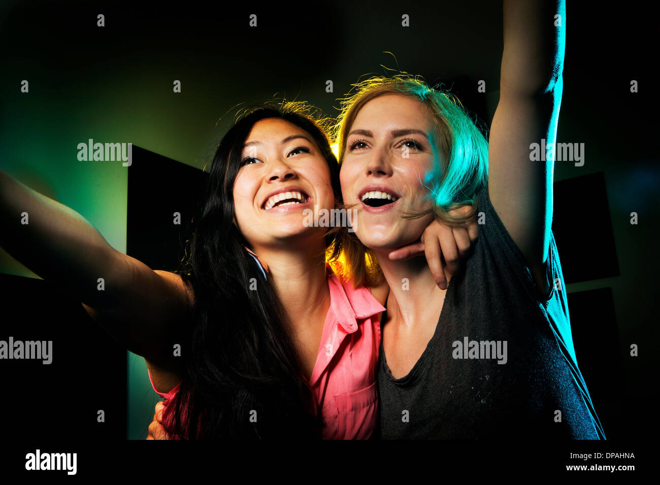 Women laughing and shouting Stock Photo - Alamy