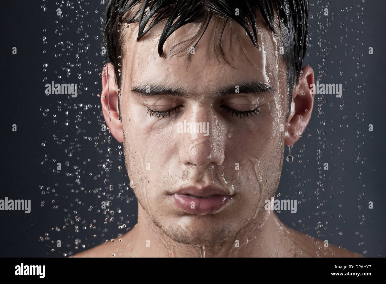 Man pouring water in her body hi-res stock photography and images - Alamy