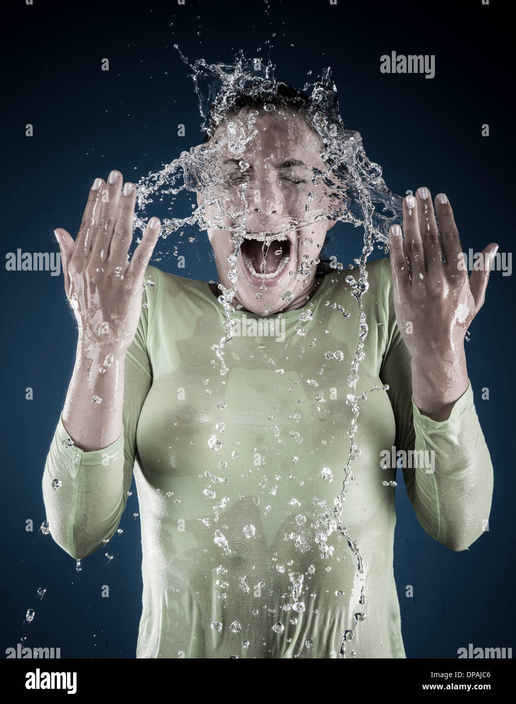 Woman splashing face hi-res stock photography and images - Alamy