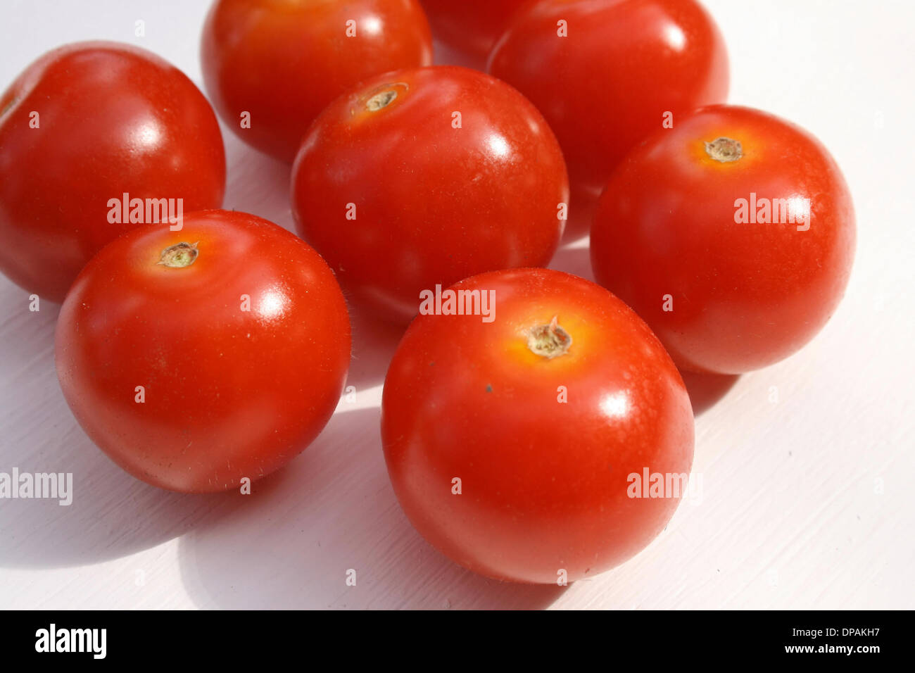 Cherry tomatoes close up Stock Photo - Alamy