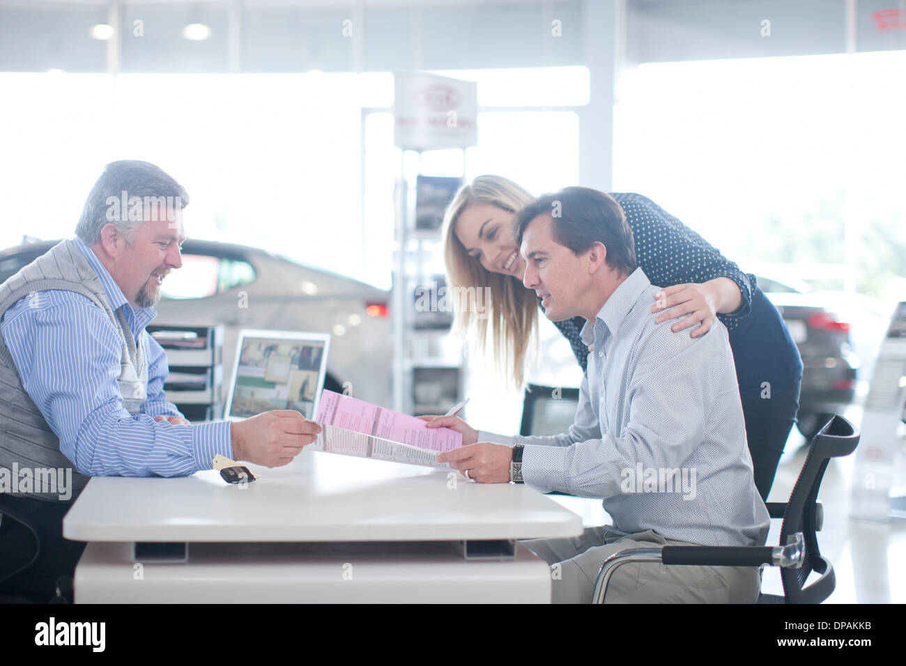 Car salesman sitting desk in hi-res stock photography and images - Alamy