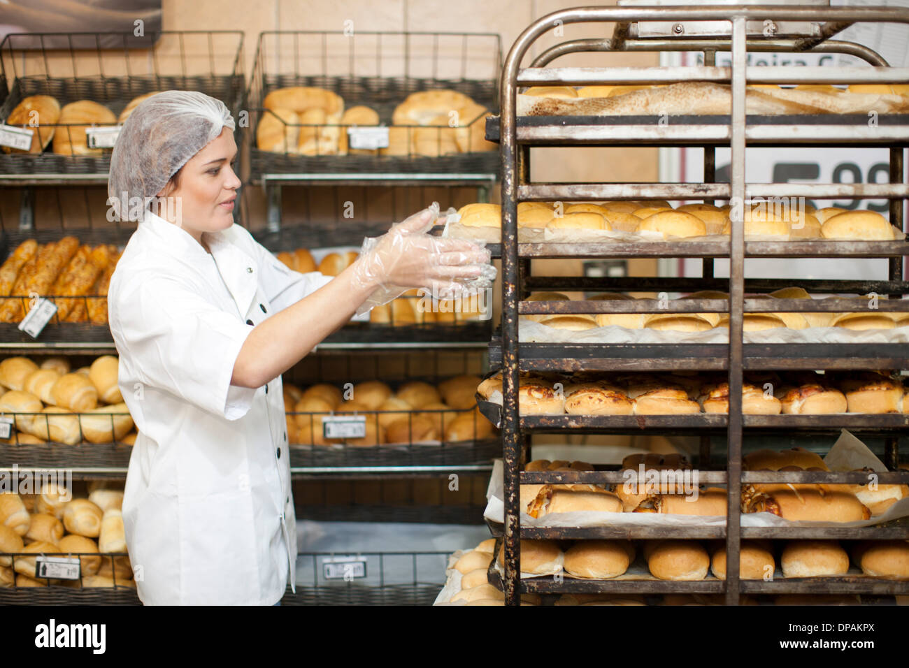 Young baker assistant hi-res stock photography and images - Alamy