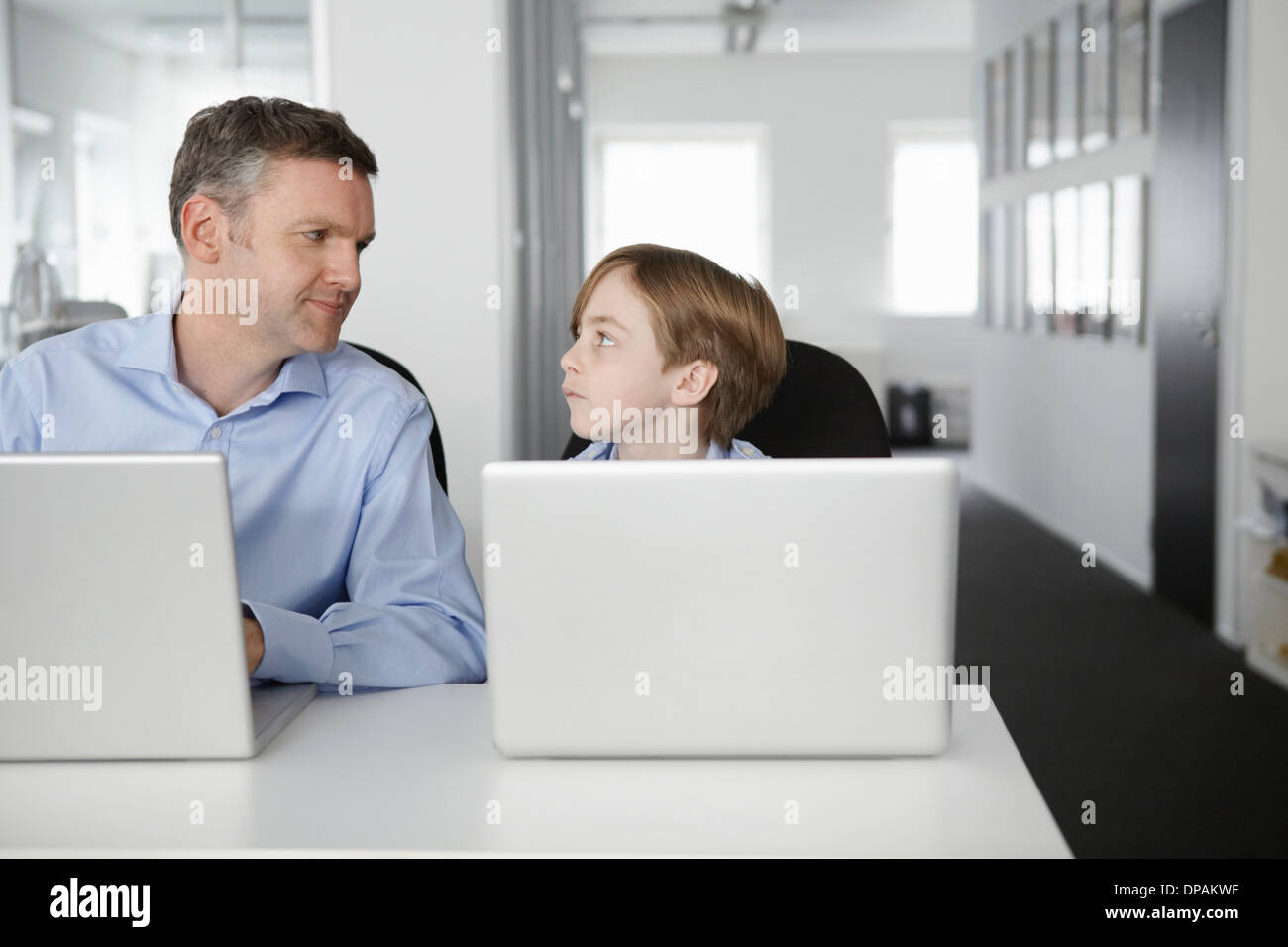 Using laptops at school hi-res stock photography and images - Alamy