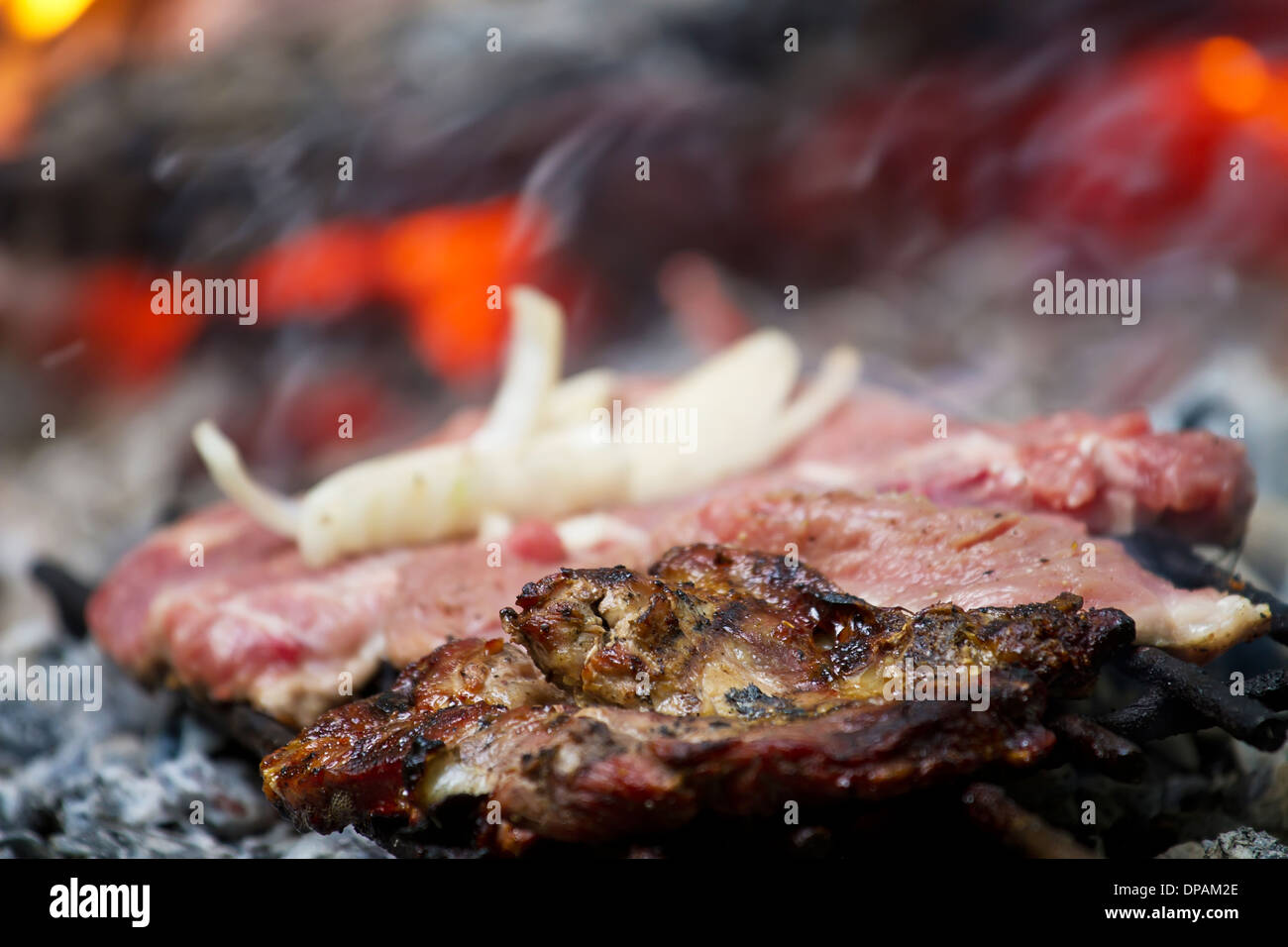 Roasting juicy meat steak on hi-res stock photography and images - Alamy