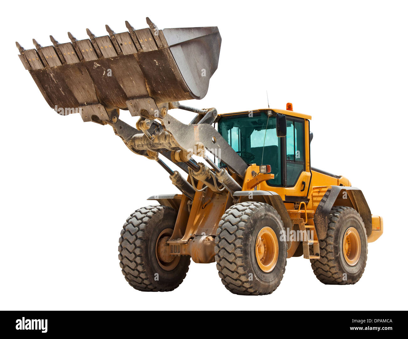 Excavator bucket on sand Cut Out Stock Images & Pictures - Alamy