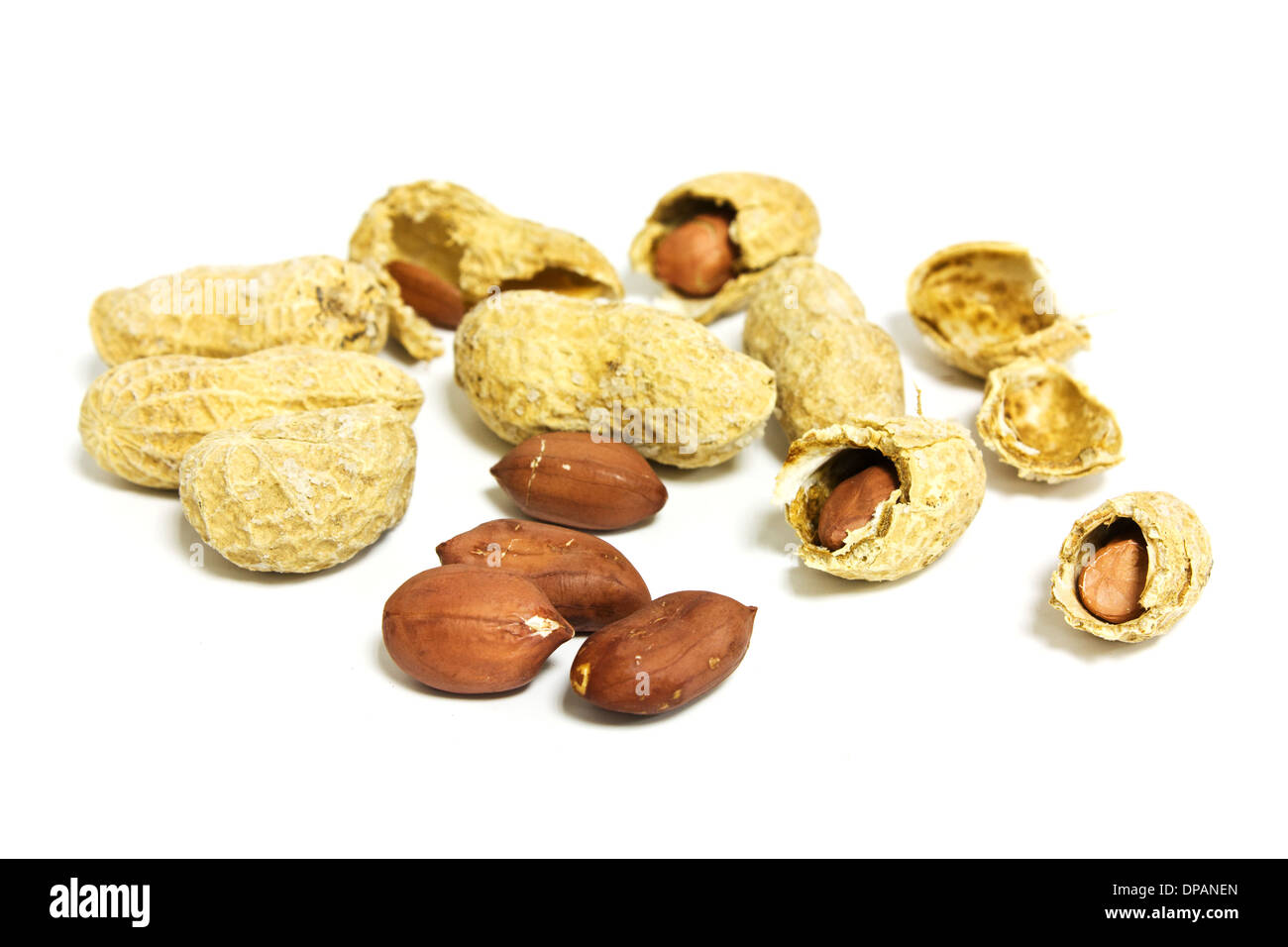 Some peanuts isolated from white Stock Photo - Alamy