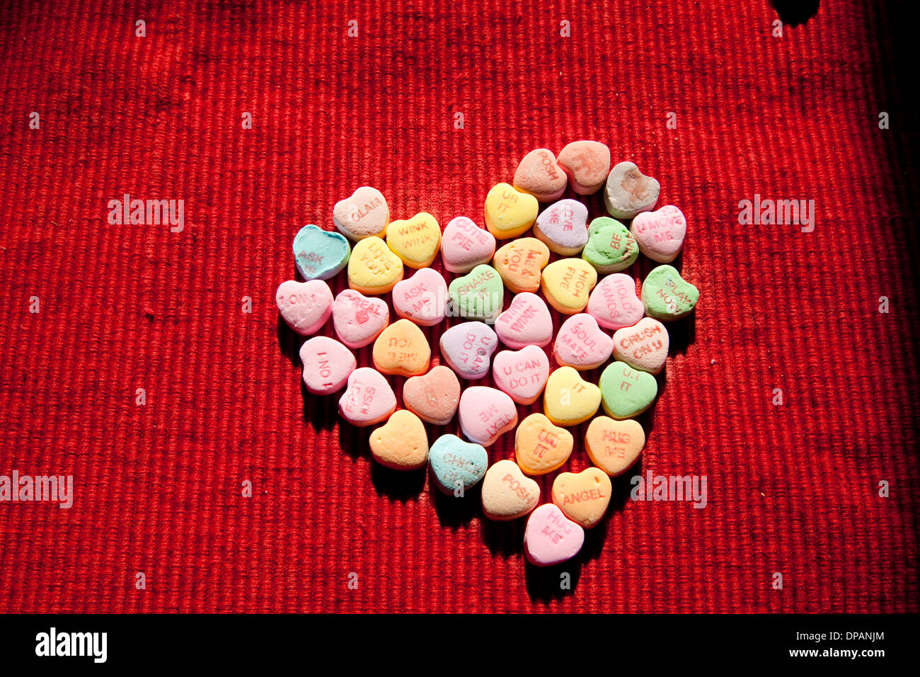 Conversation hearts in a large heart shape Stock Photo - Alamy