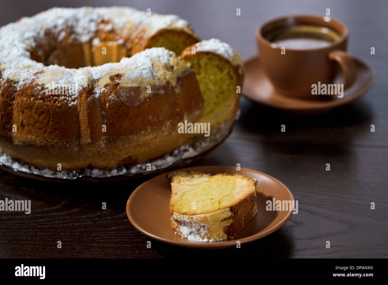 Round cake with sugar top and coffee. Traditional cuisine Stock Photo ...