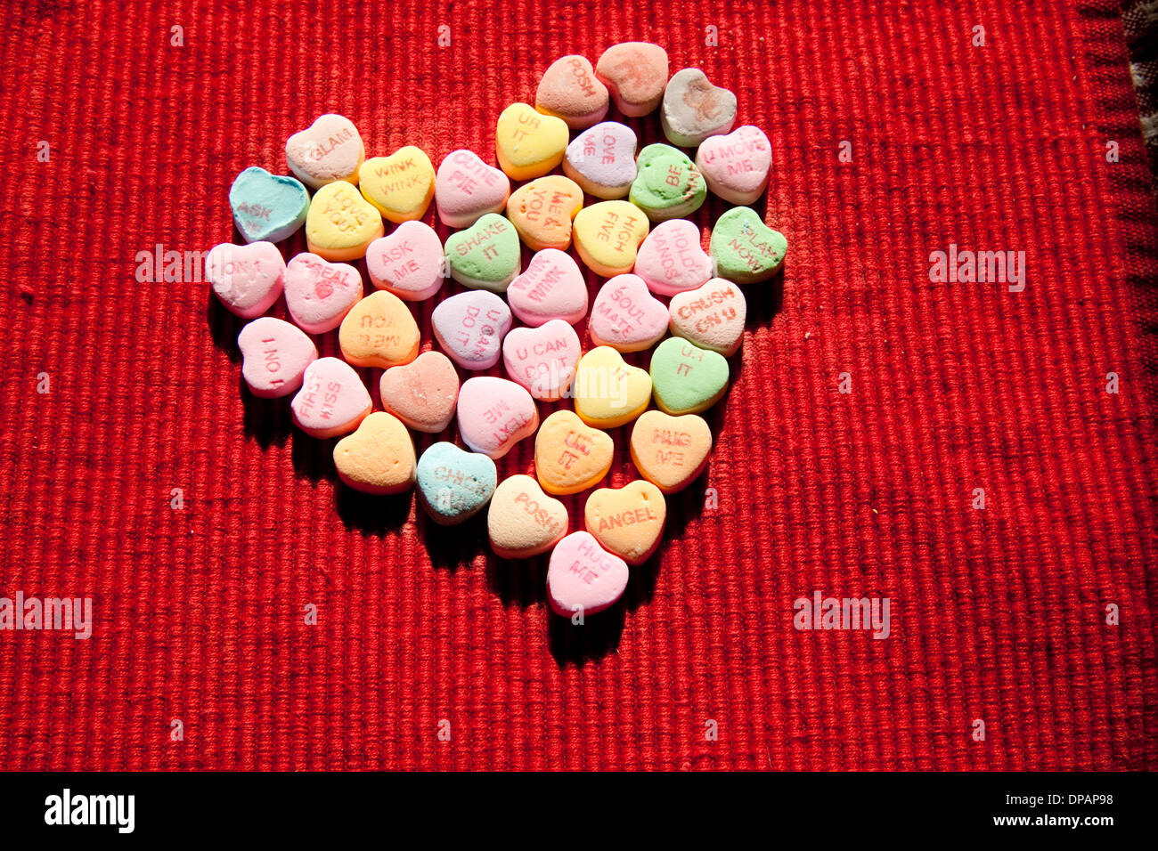 Conversation hearts in a large heart shape hi-res stock photography and ...