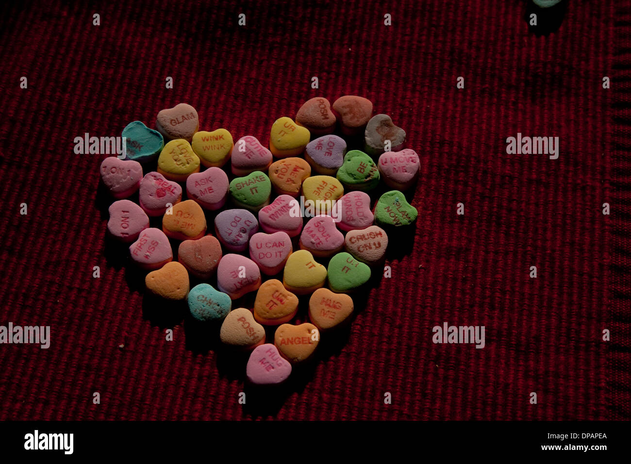 Conversation hearts in a large heart shape hi-res stock photography and ...