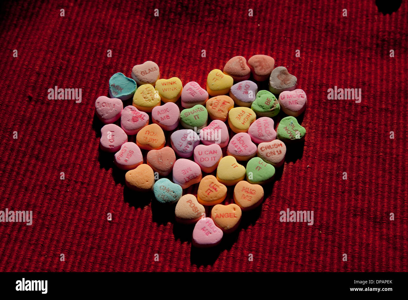 Conversation hearts in a large heart shape hi-res stock photography and ...