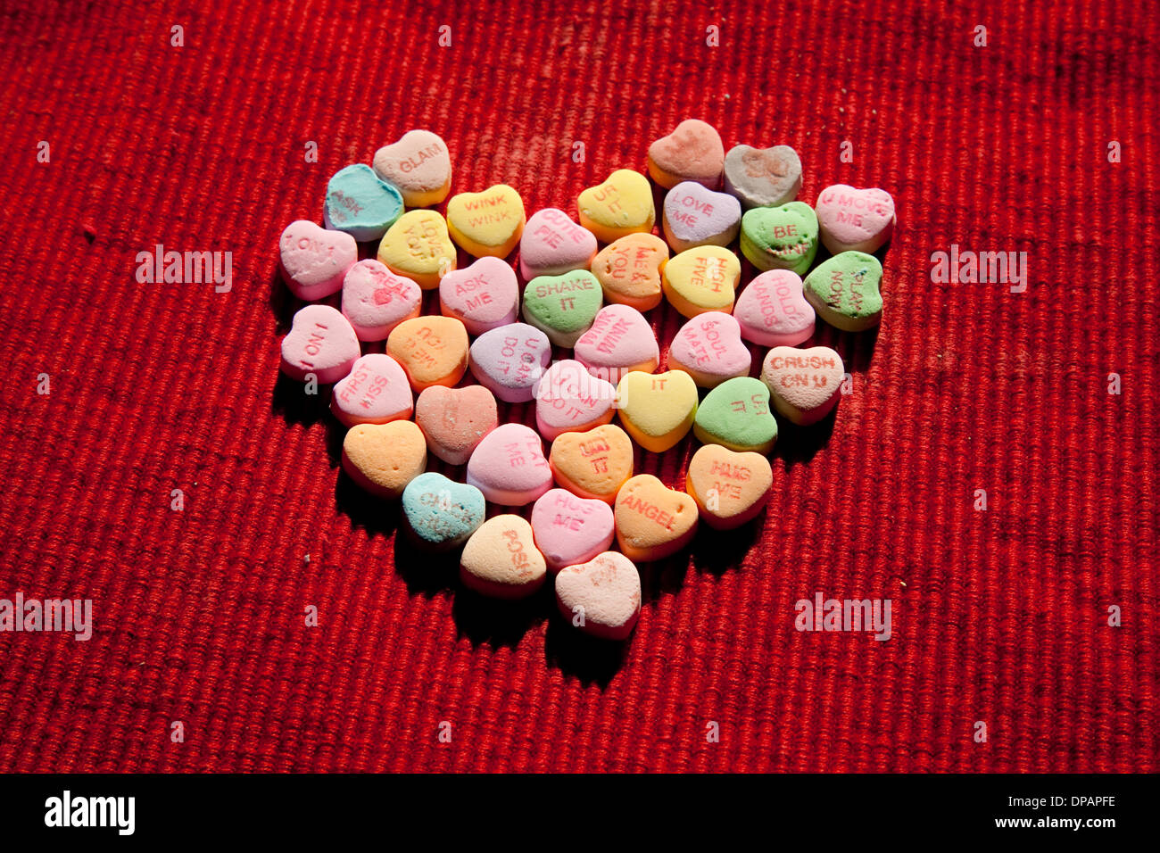 Conversation hearts in a large heart shape Stock Photo - Alamy