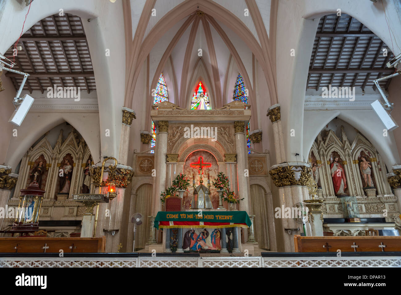 The chancel and altar area with many statues and bas-relief at the ...