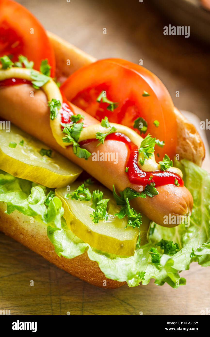 Fresh hot dog with sausage and vegetables Stock Photo - Alamy