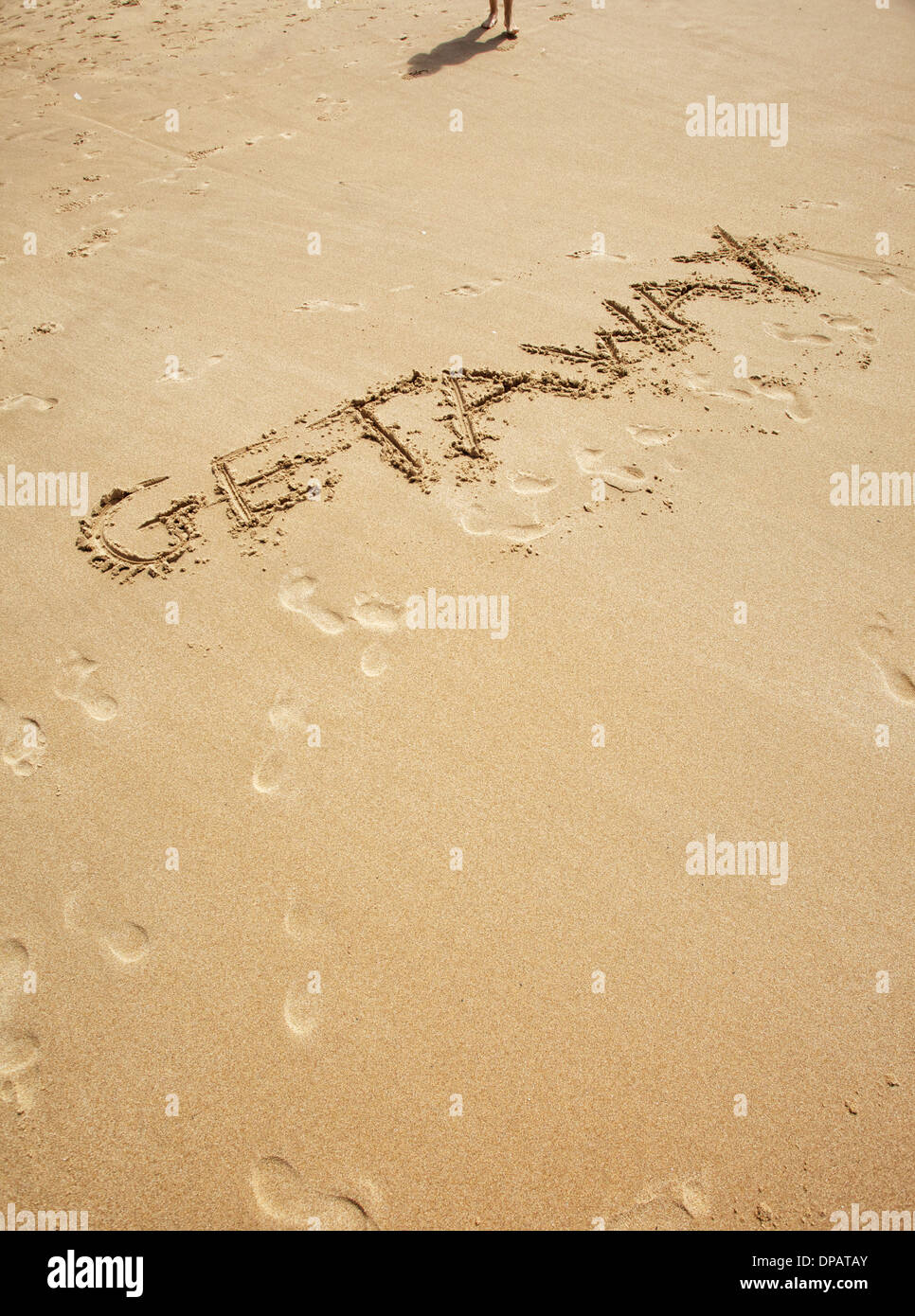 Message or greeting written in sand at the beach Stock Photo - Alamy