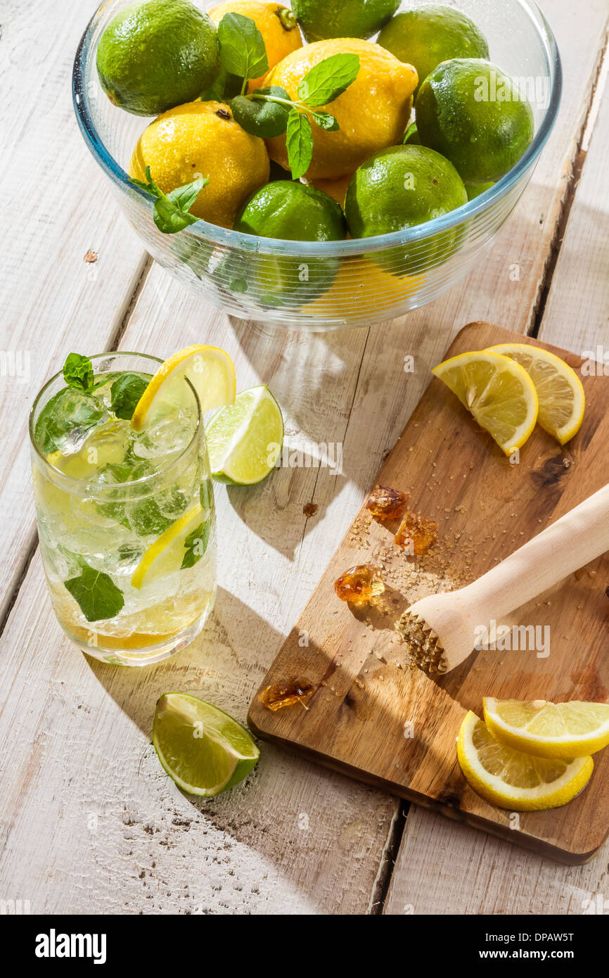 Crushed sugar and citrus fruits for cold drink Stock Photo - Alamy