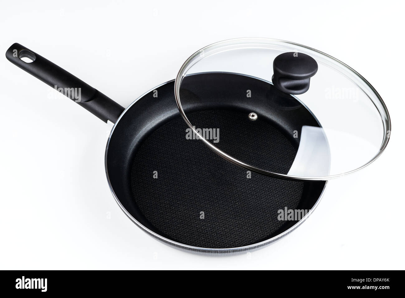 Frying pan with a teflon covering isolated on a white background Stock ...