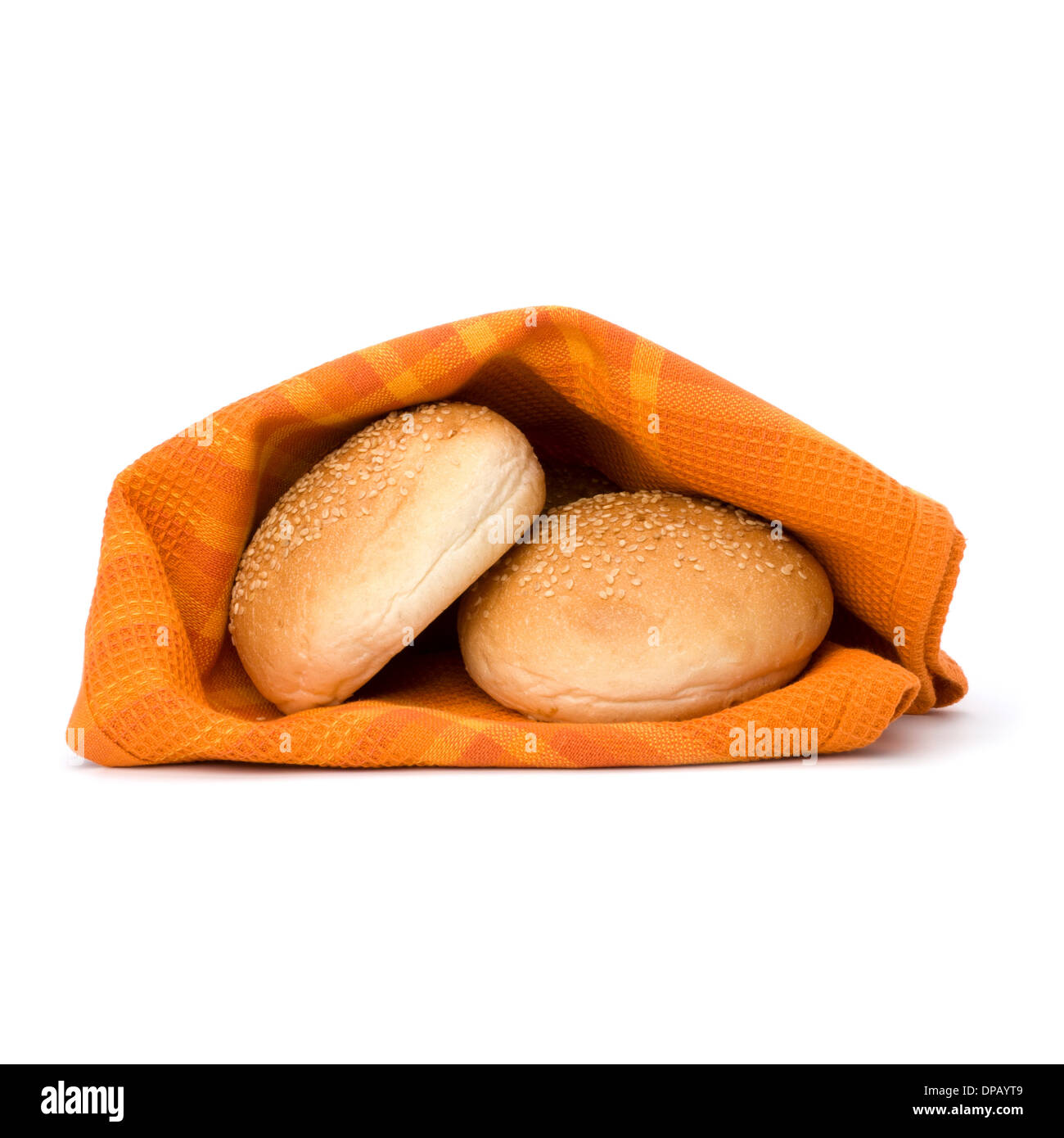 Fresh warm bread over kitchen towel isolated on white background Stock ...