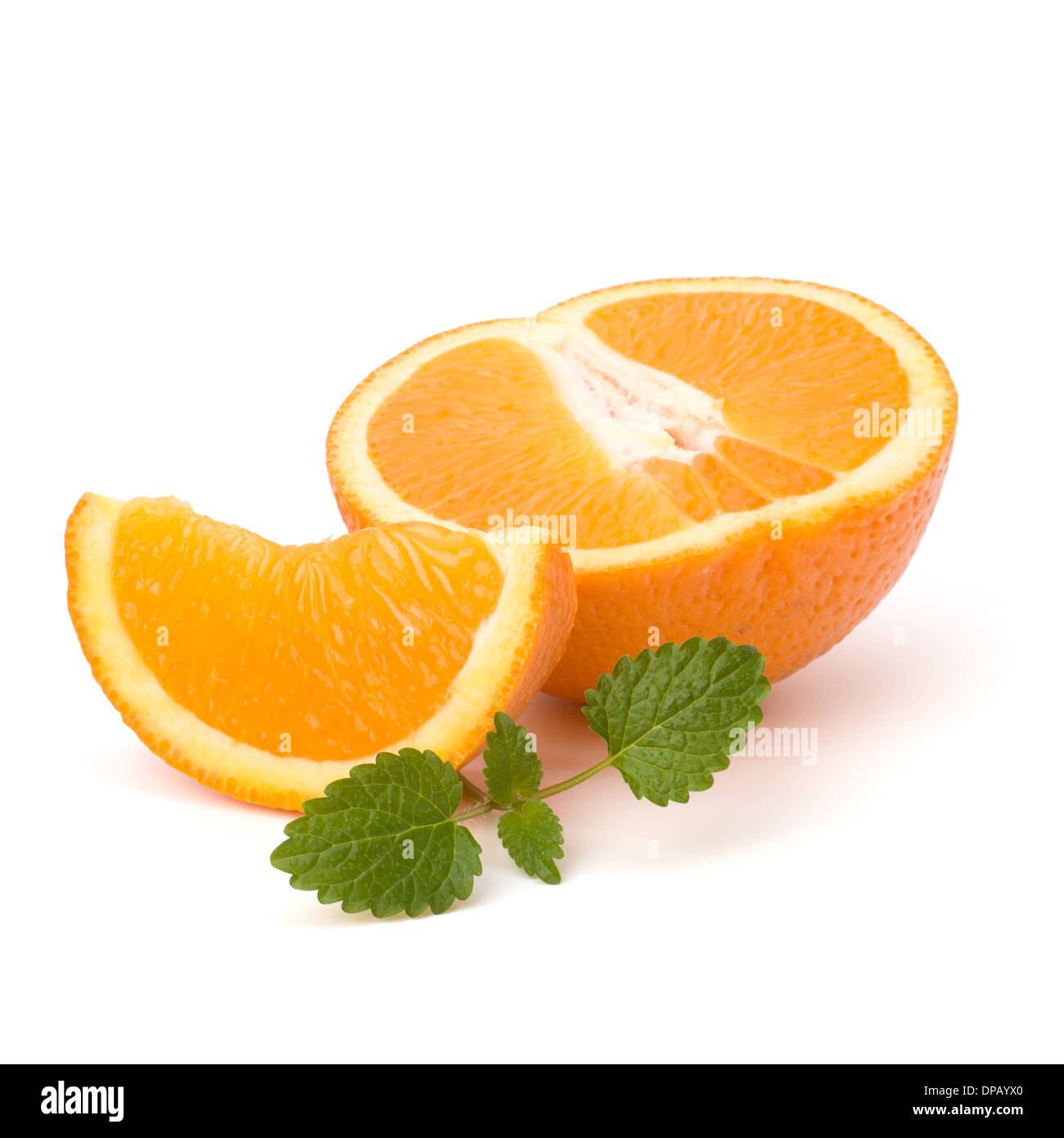 Orange fruit segment and citron mint leaf isolated on white background ...