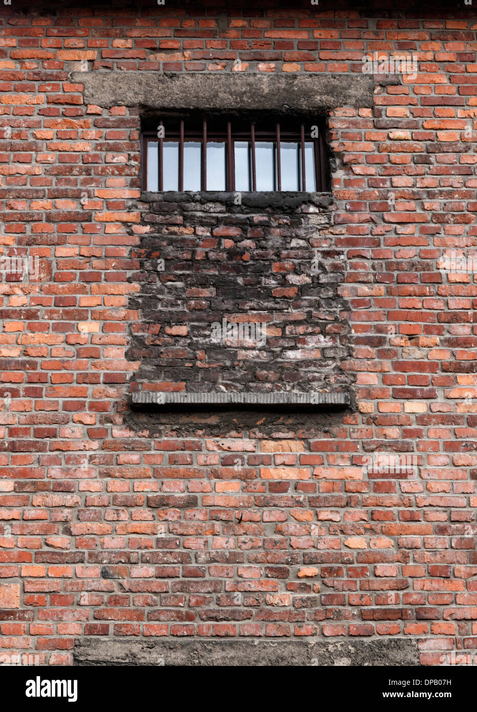 Barred window on brick building Stock Photo - Alamy