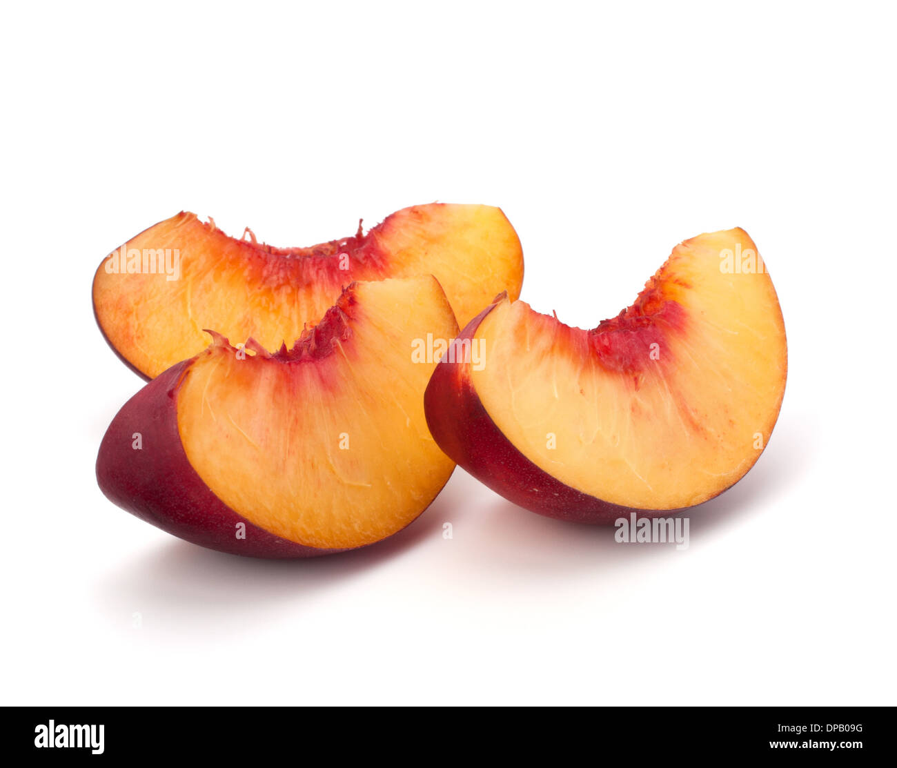 Nectarine fruit segments isolated on white background Stock Photo - Alamy