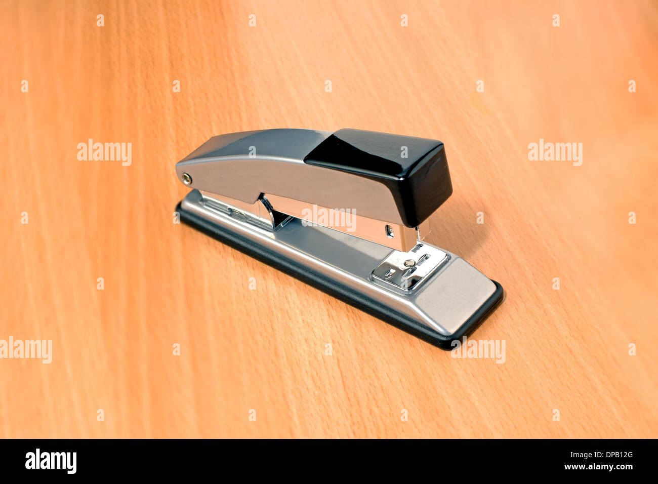 Stapler on desk background Stock Photo - Alamy