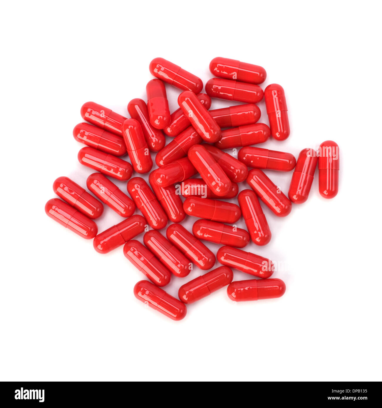 red capsules isolated on white background Stock Photo - Alamy