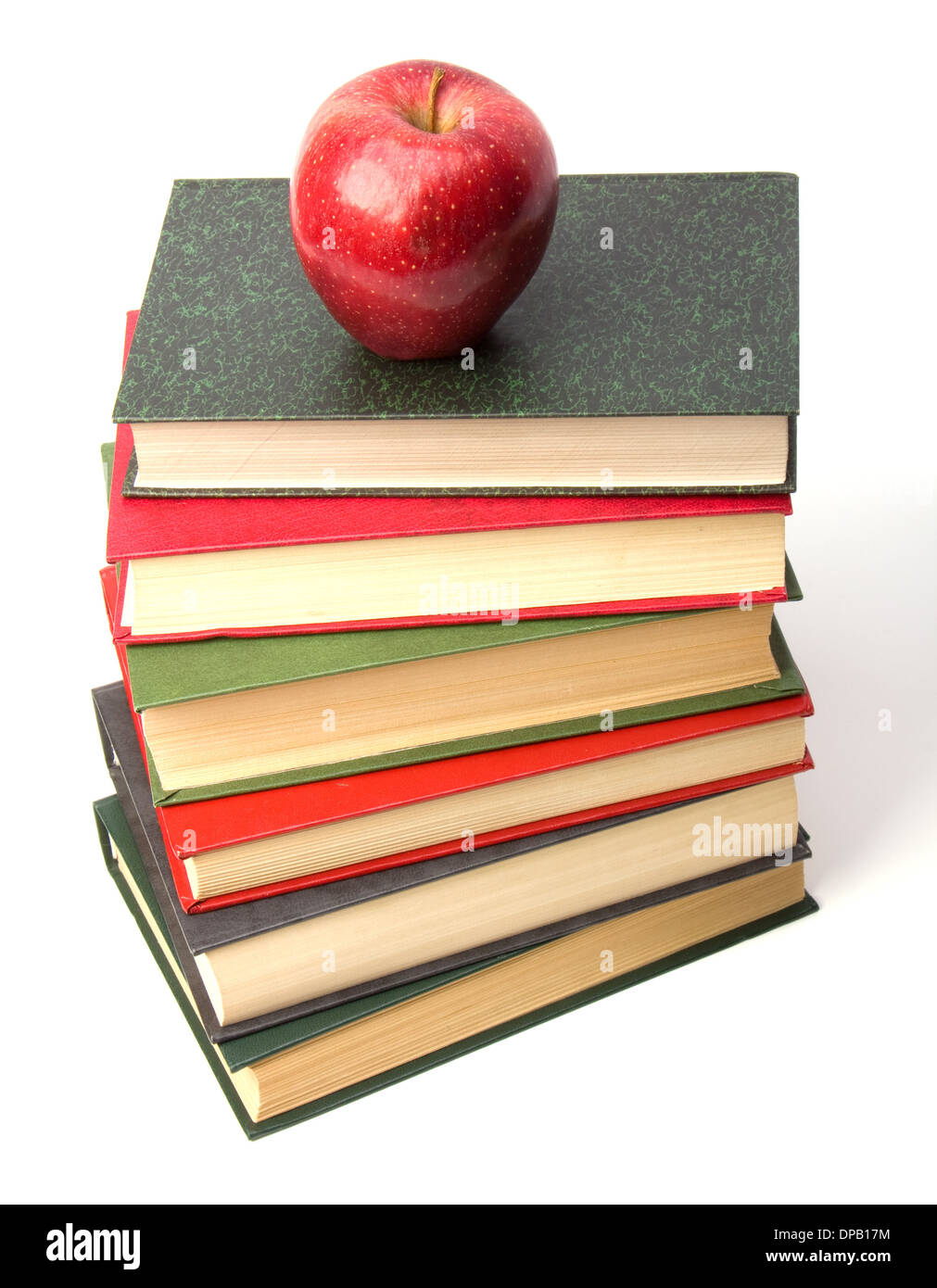 book stack with apple isolated on white background Stock Photo - Alamy