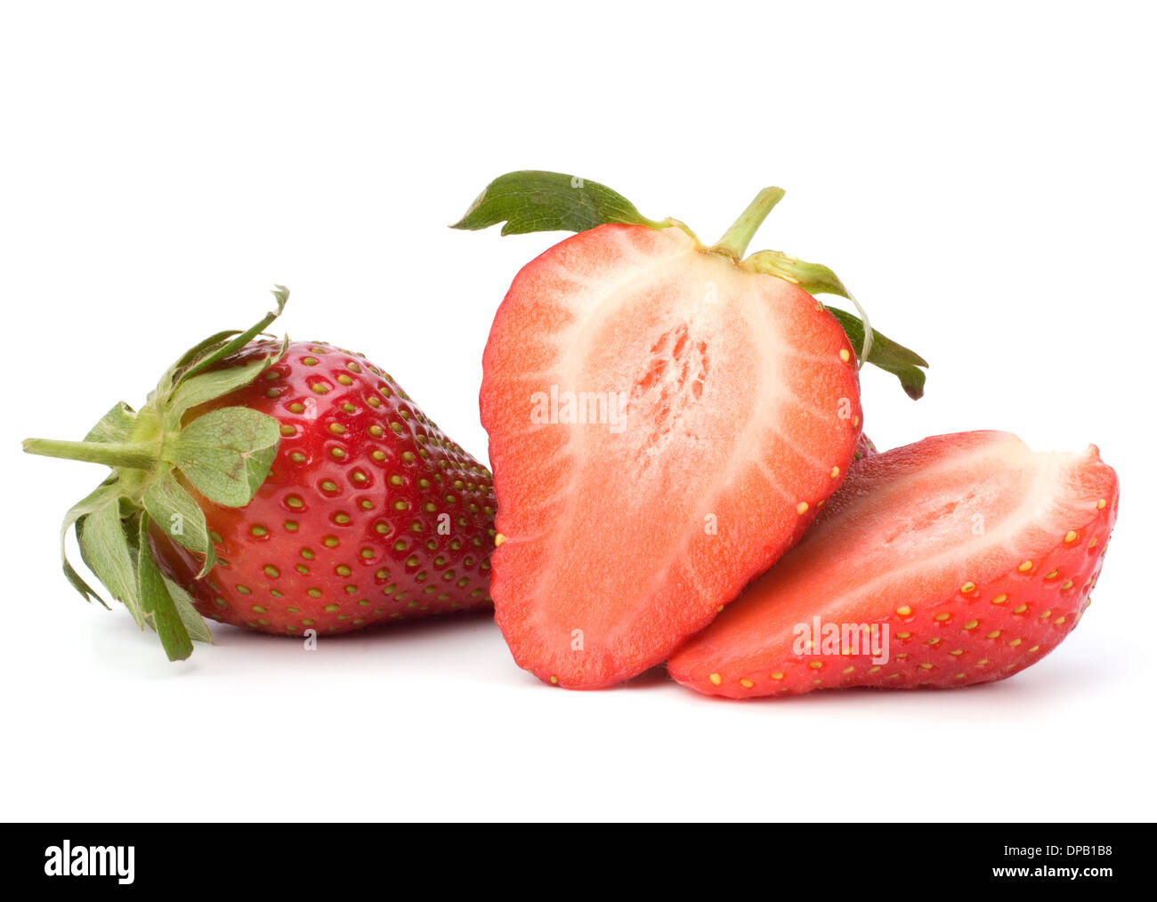 Halved strawberries isolated on white background Stock Photo - Alamy