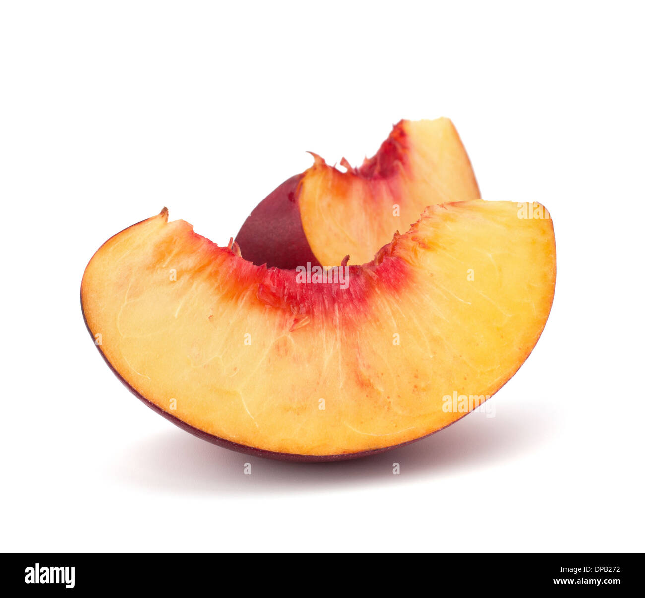 Nectarine fruit segments isolated on white background Stock Photo - Alamy