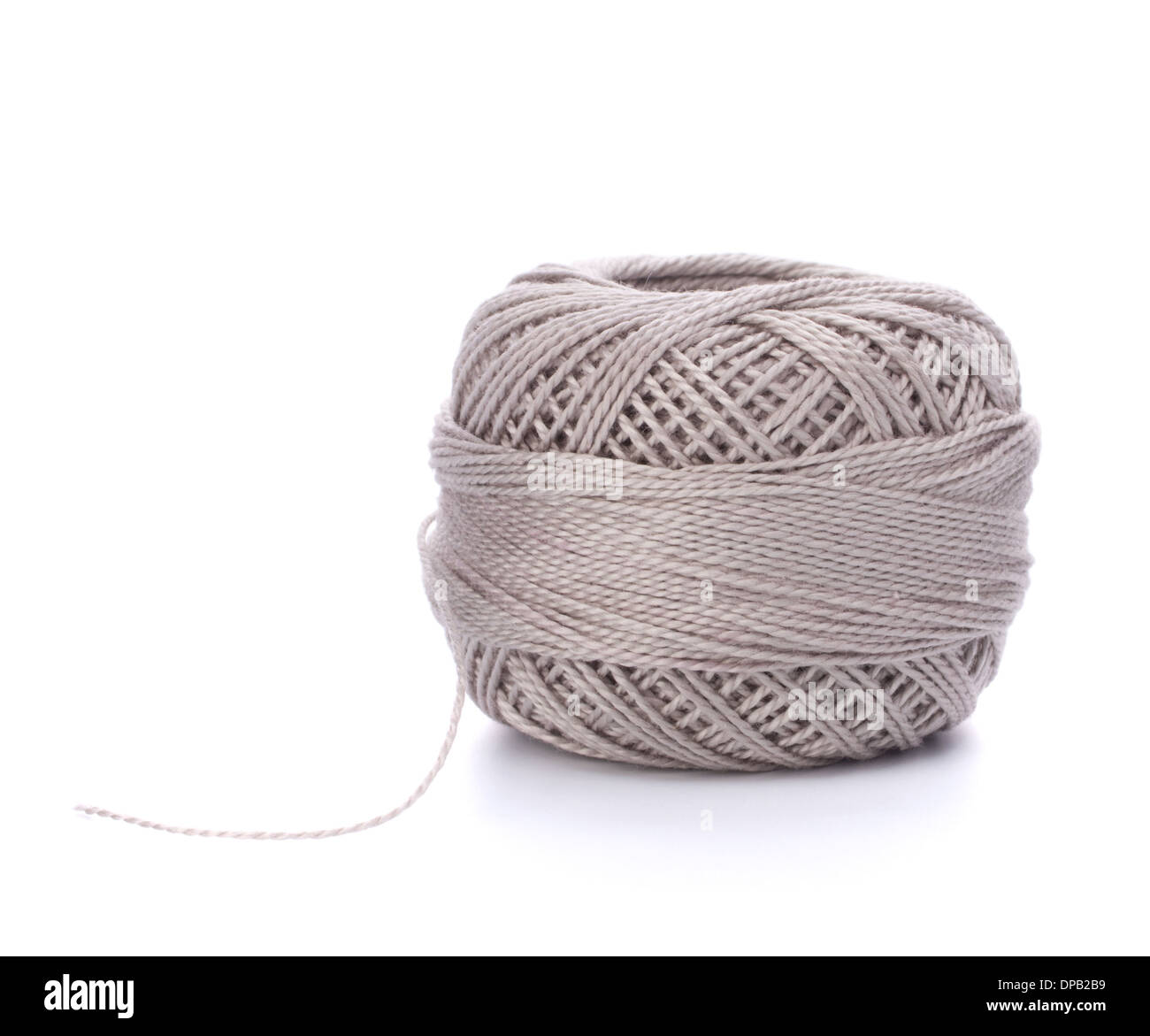 spool of grey thread isolated on white background Stock Photo - Alamy