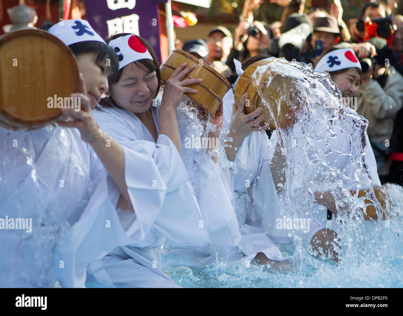 Tokyo, Japan. 11th Jan, 2014. Japanese women bathe icy water to test ...