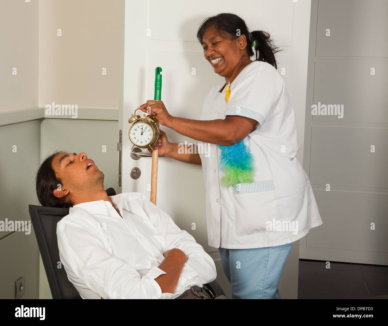 Woman cleaning man sleeping hi-res stock photography and images - Alamy