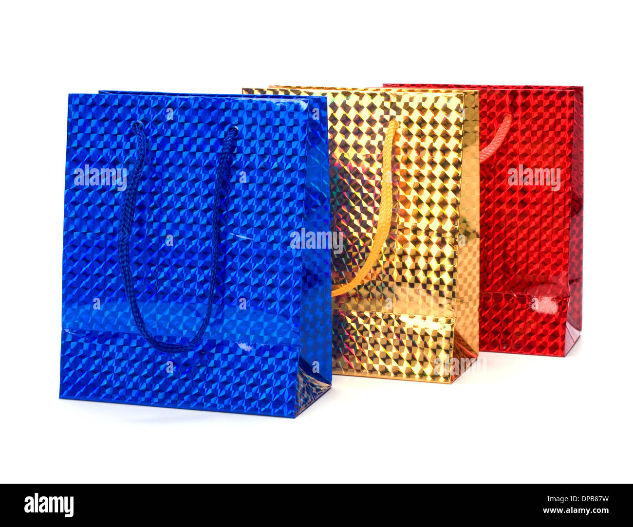 shiny paper gift bags isolated on white background Stock Photo - Alamy