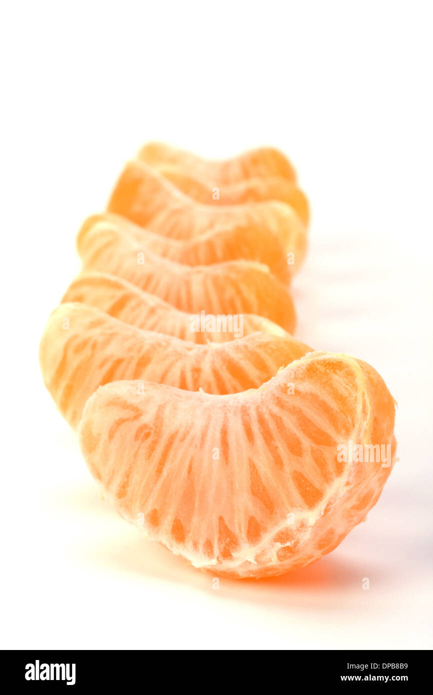 peeled mandarin segments isolated on white background Stock Photo - Alamy