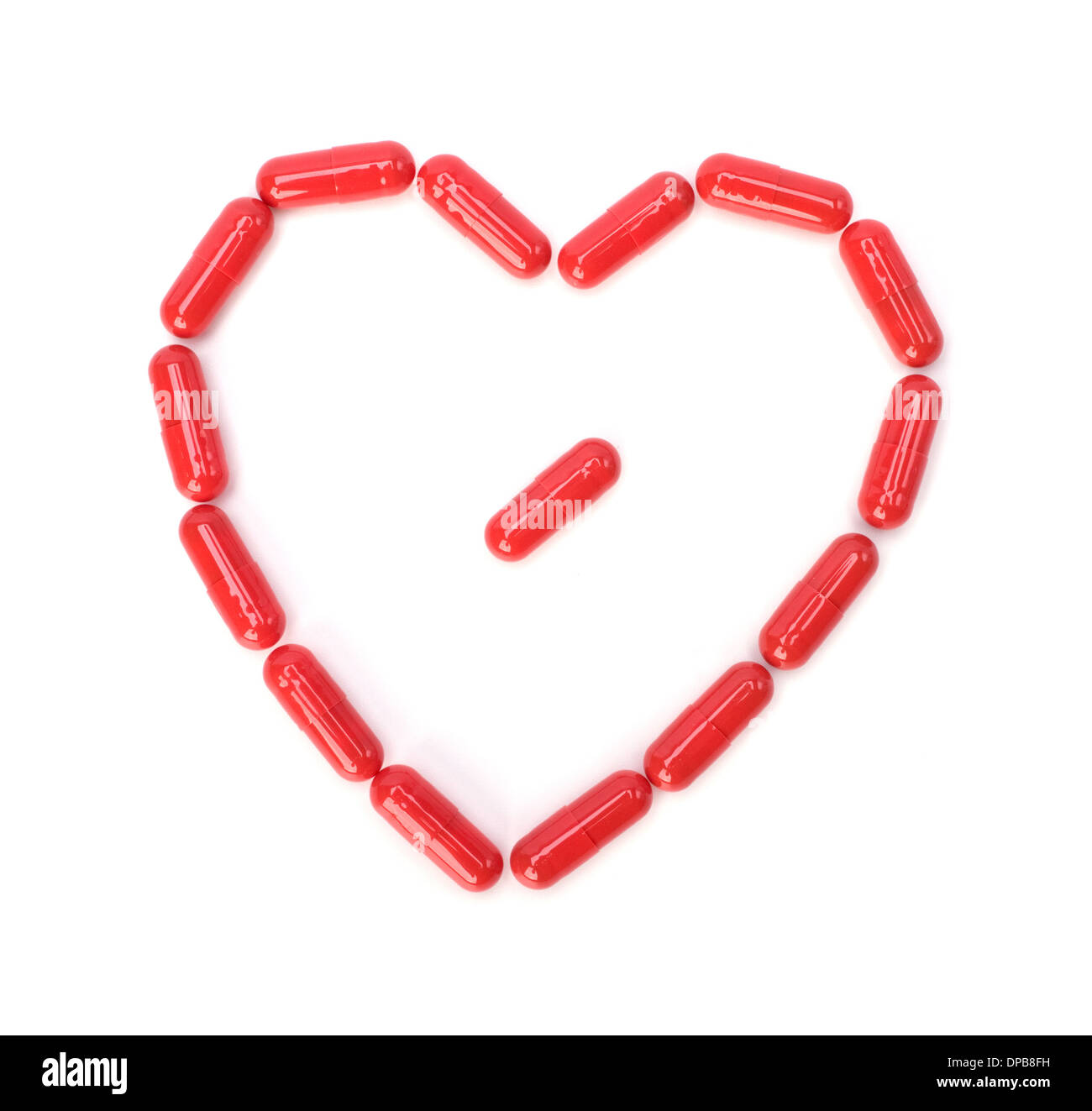 red capsules isolated on white background Stock Photo - Alamy