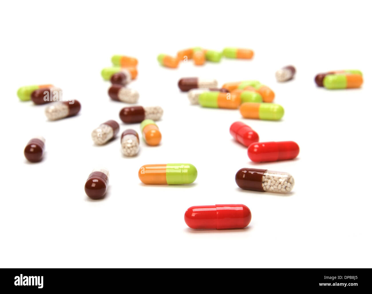 Capsules isolated on white background Stock Photo - Alamy