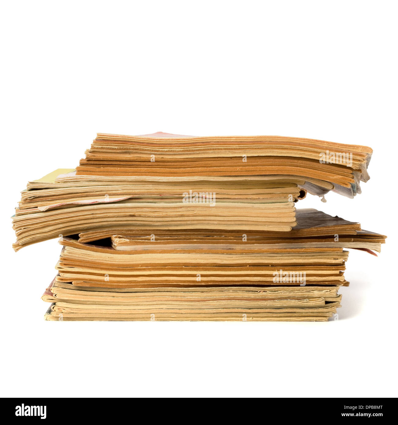 tattered journals stack isolated on white background Stock Photo - Alamy