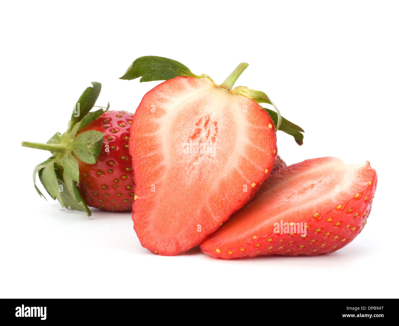 Halved strawberries isolated on white background Stock Photo - Alamy