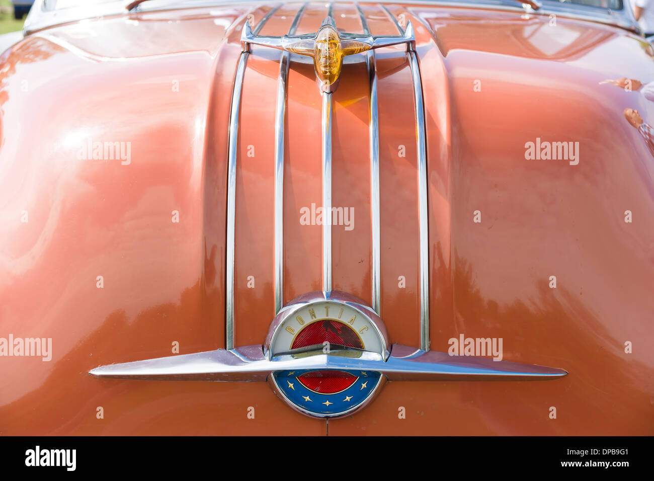 The emblem on the hood of a two-door coupe Pontiac Star Chief, First ...