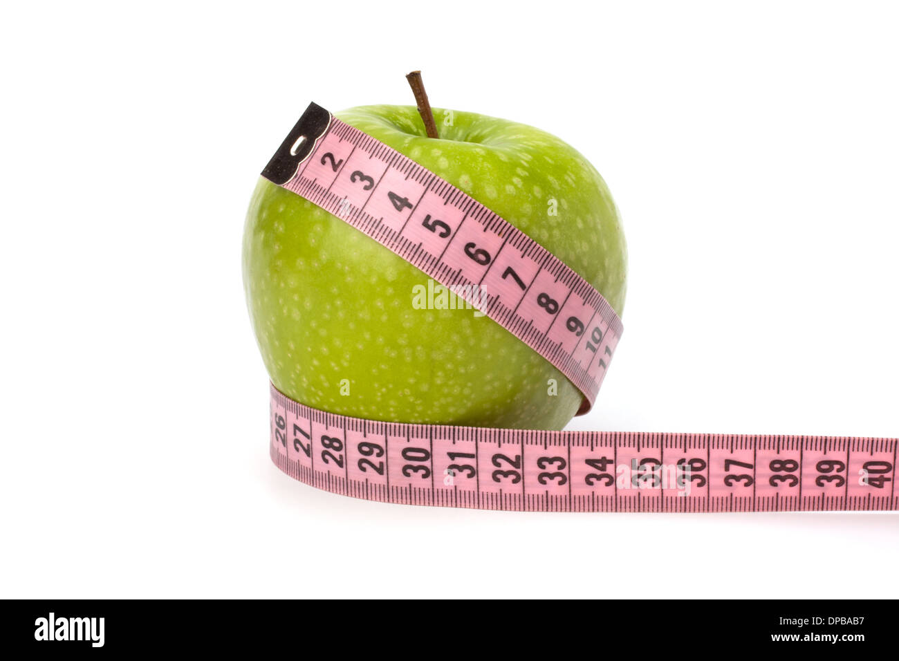 Apple with tape measure isolated on white background. Healthy lifestyle ...