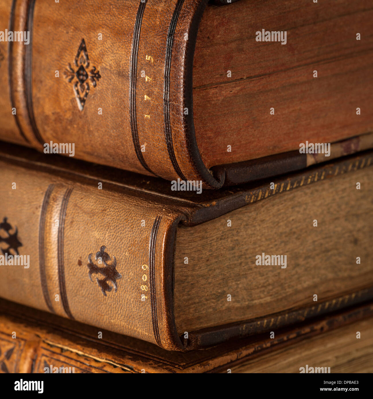 Unidentified old books in brown leather binding with dates showing on ...