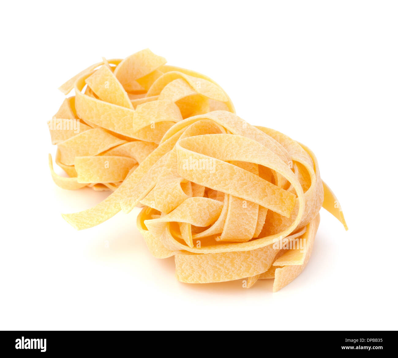 Italian pasta fettuccine nest isolated on white background Stock Photo ...