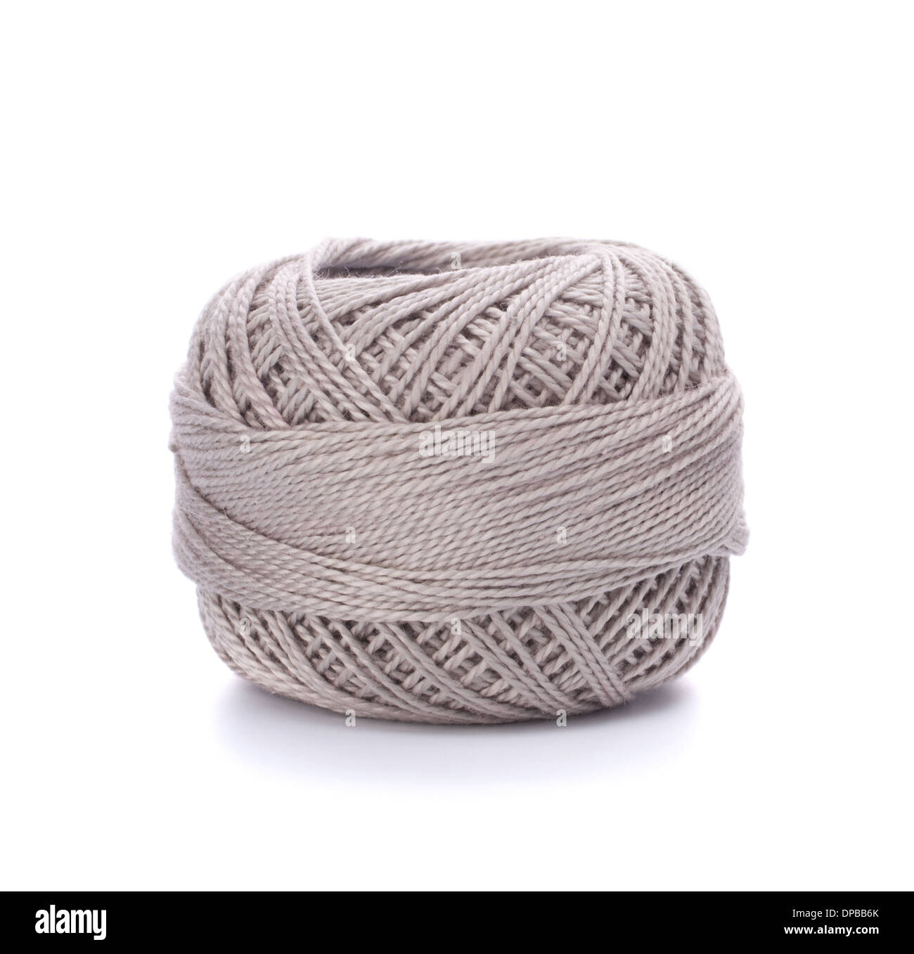 spool of grey thread isolated on white background Stock Photo - Alamy