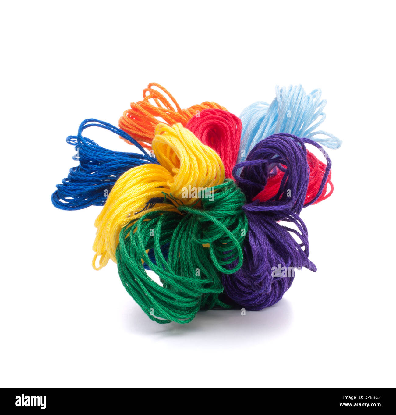 Color threads bunch isolated on white background cutout Stock Photo - Alamy