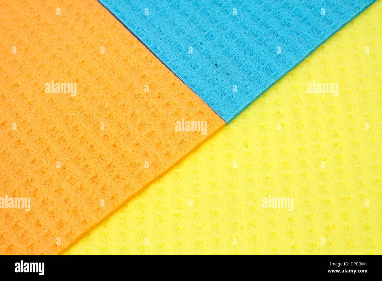 Kitchen towels porous absorbent material in yellow, orange and blue ...