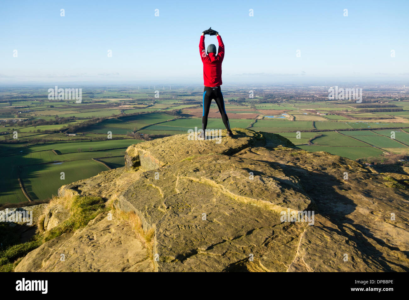 Trail runner/fell runner on summit of Roseberry Topping, North York ...